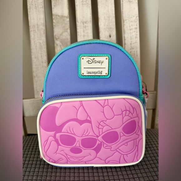 Loungefly | Bags | Loungefly Disney Daisy Duck Minnie Mouse Convertible ...